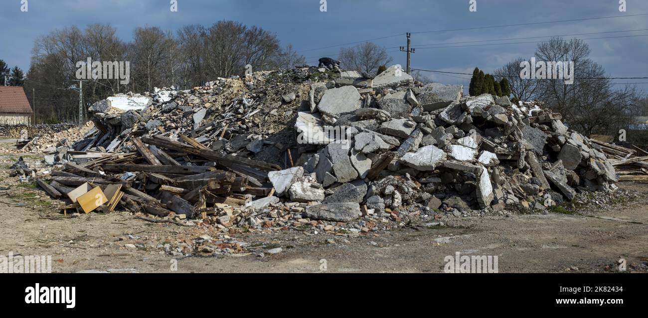 Heap of construction waste, concrete and brick Stock Photo - Alamy