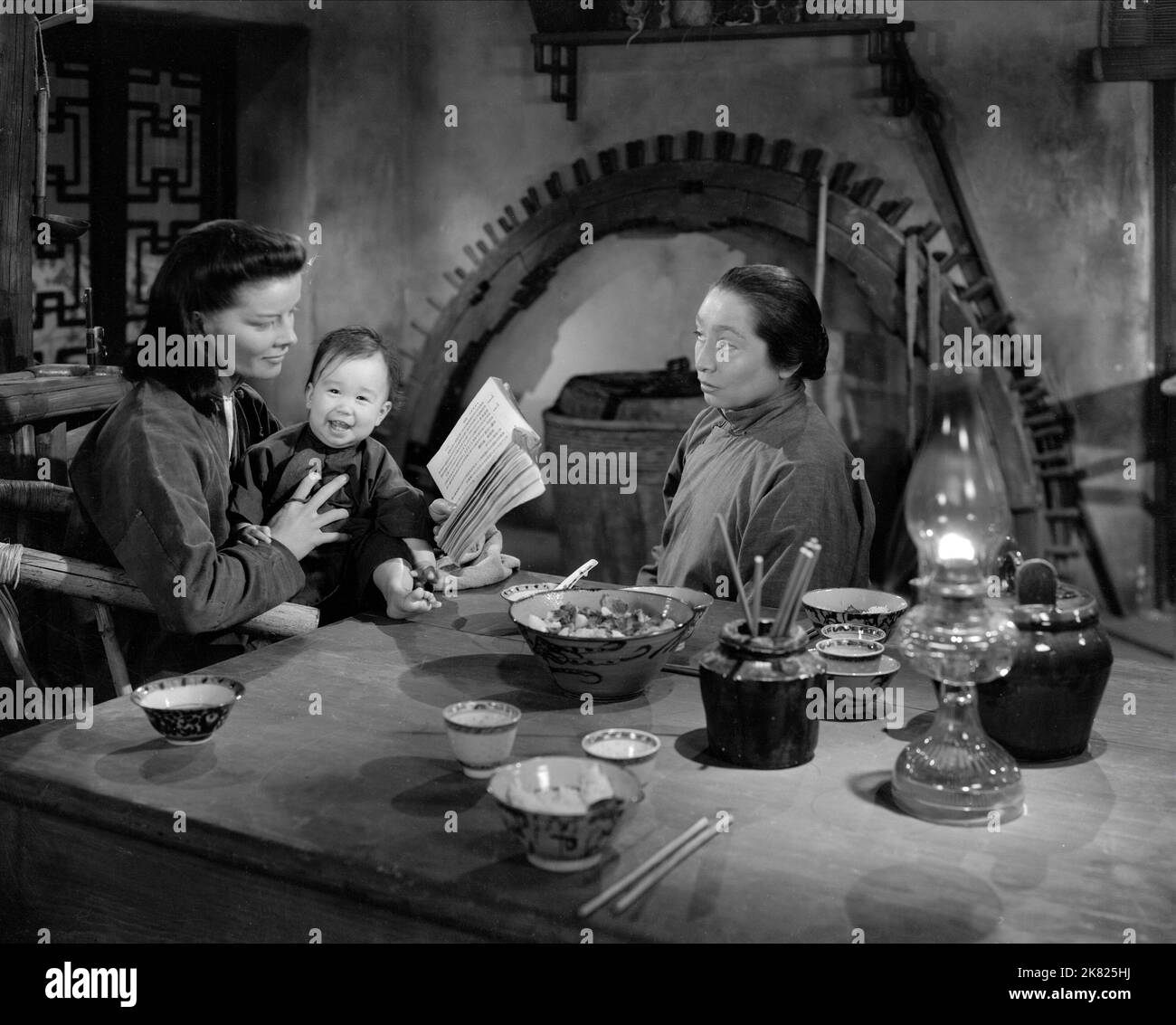 Katharine Hepburn Holding Baby Film: Dragon Seed (1944) Characters: Jade Tan Director: Harold S ...