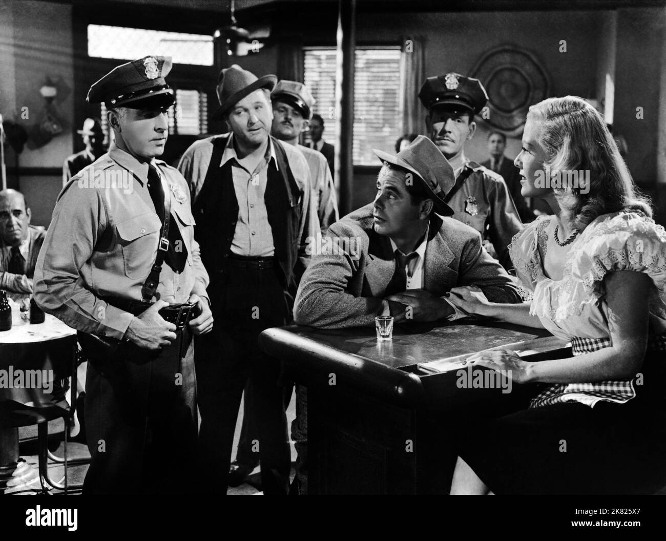 Glenn Ford & Janis Carter Film Framed (1947) Characters: Mike Lambert ...