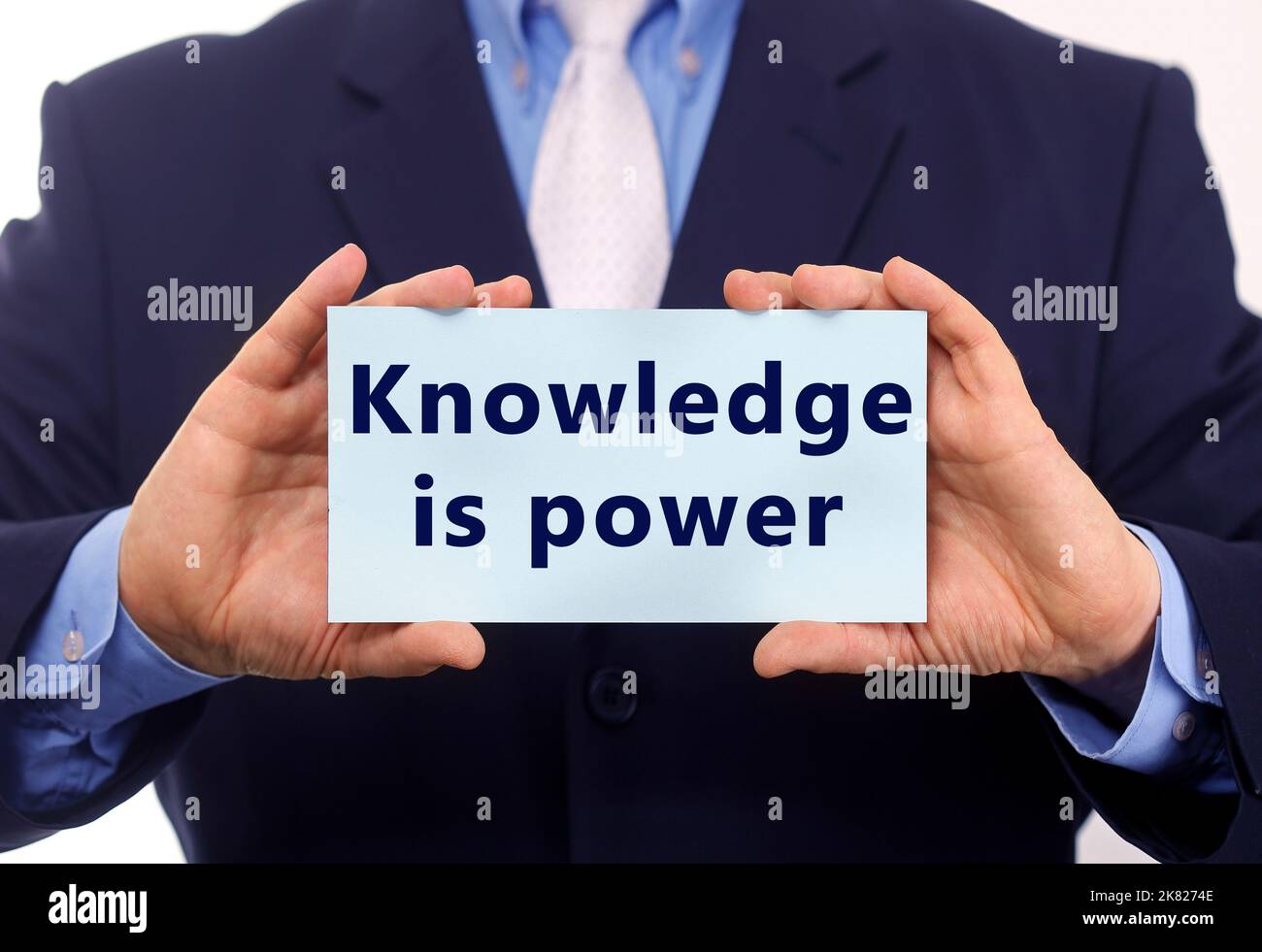 Business man hold paper knowledge is power on it Stock Photo - Alamy