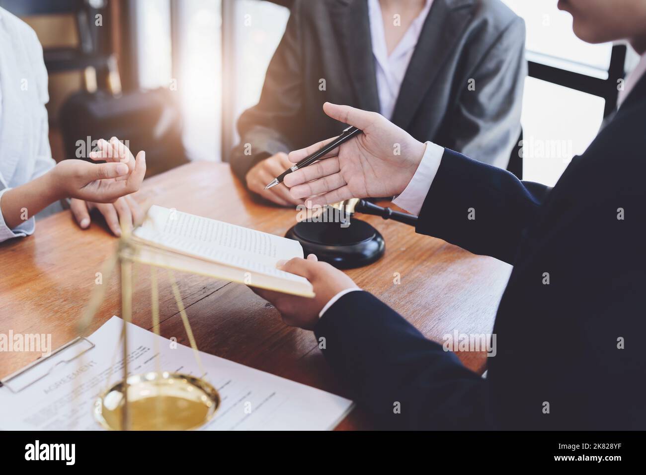 The client is consulting with a lawyer on legal matters Stock Photo - Alamy