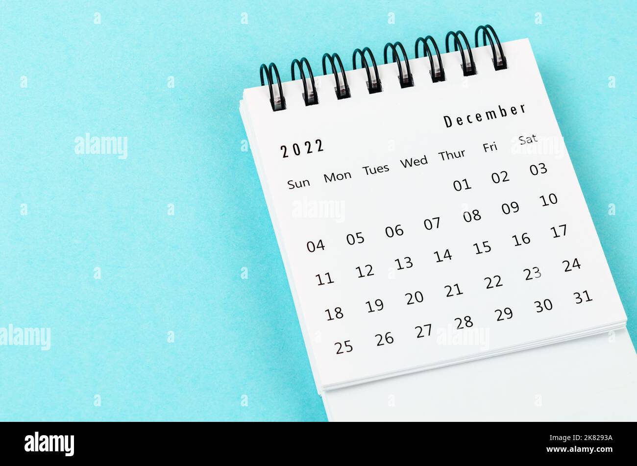 December 2022 Monthly desk calendar for 2022 year on blue background ...