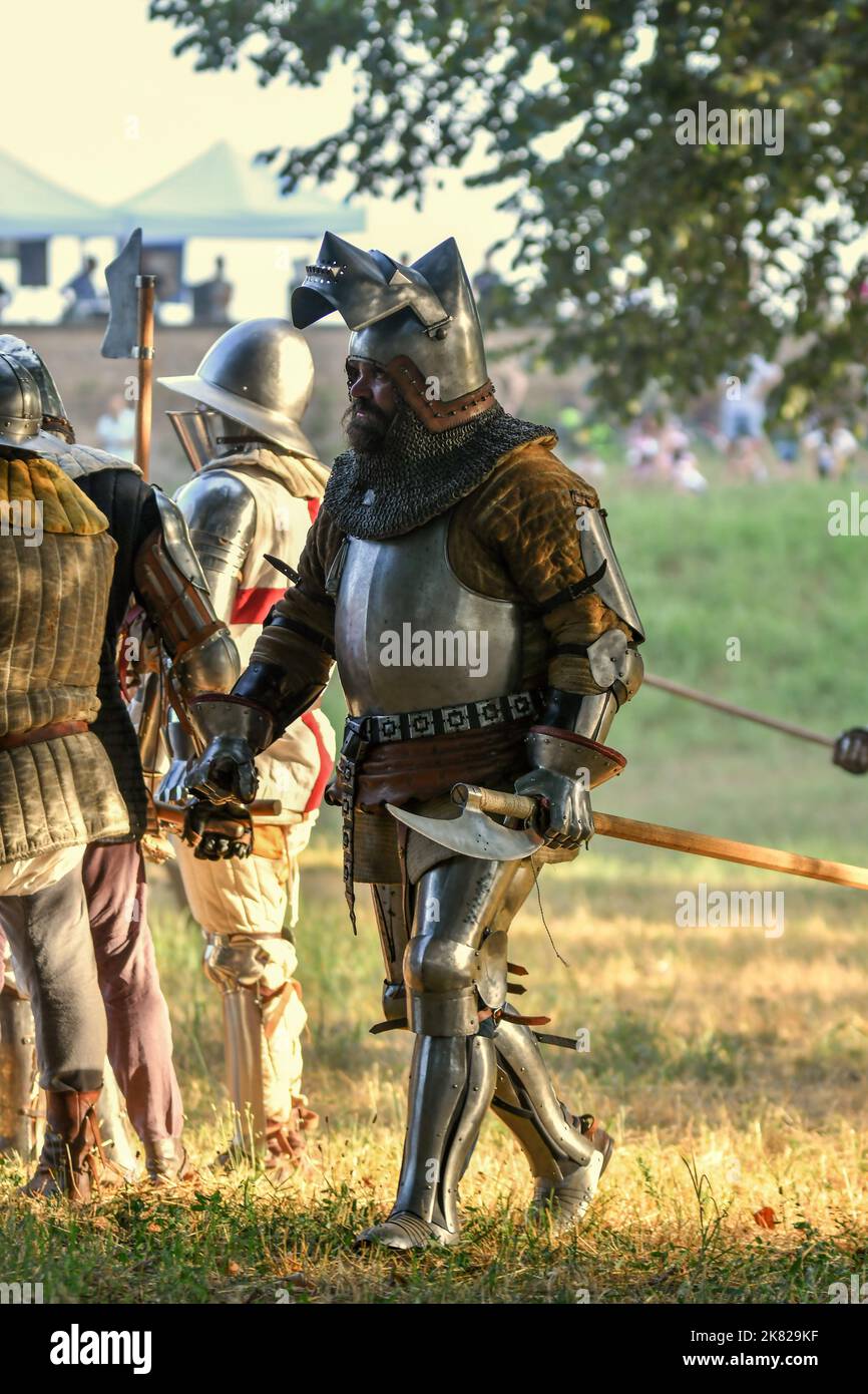 historical re-enactment of medieval battle in period costumes ...