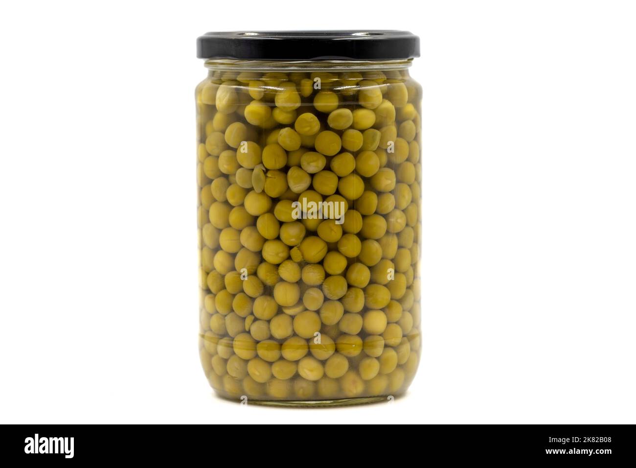 Canned peas in glass jar isolated on white background Stock Photo - Alamy