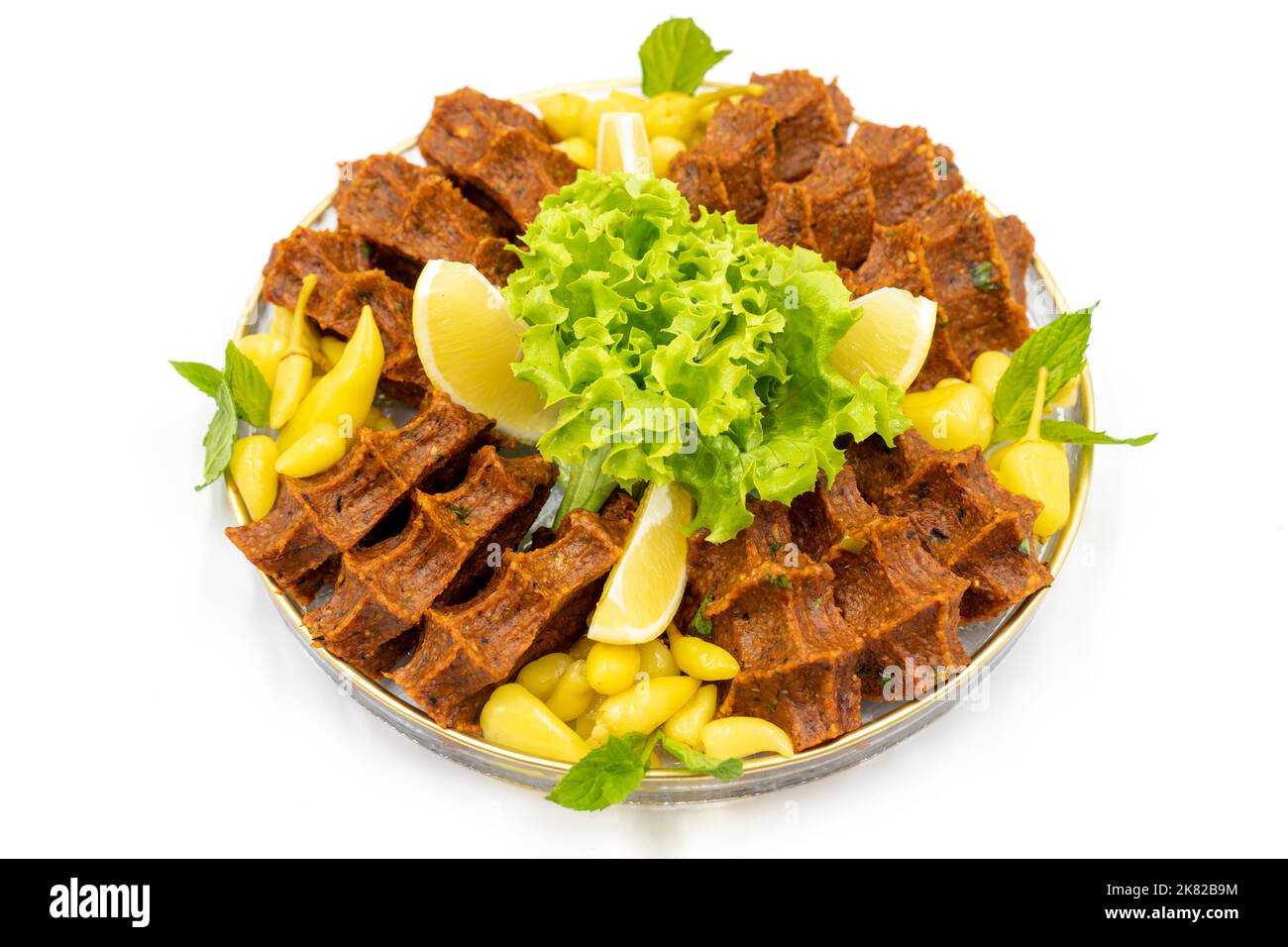 Cig kofte or raw meatballs isolated on white background. Traditional ...