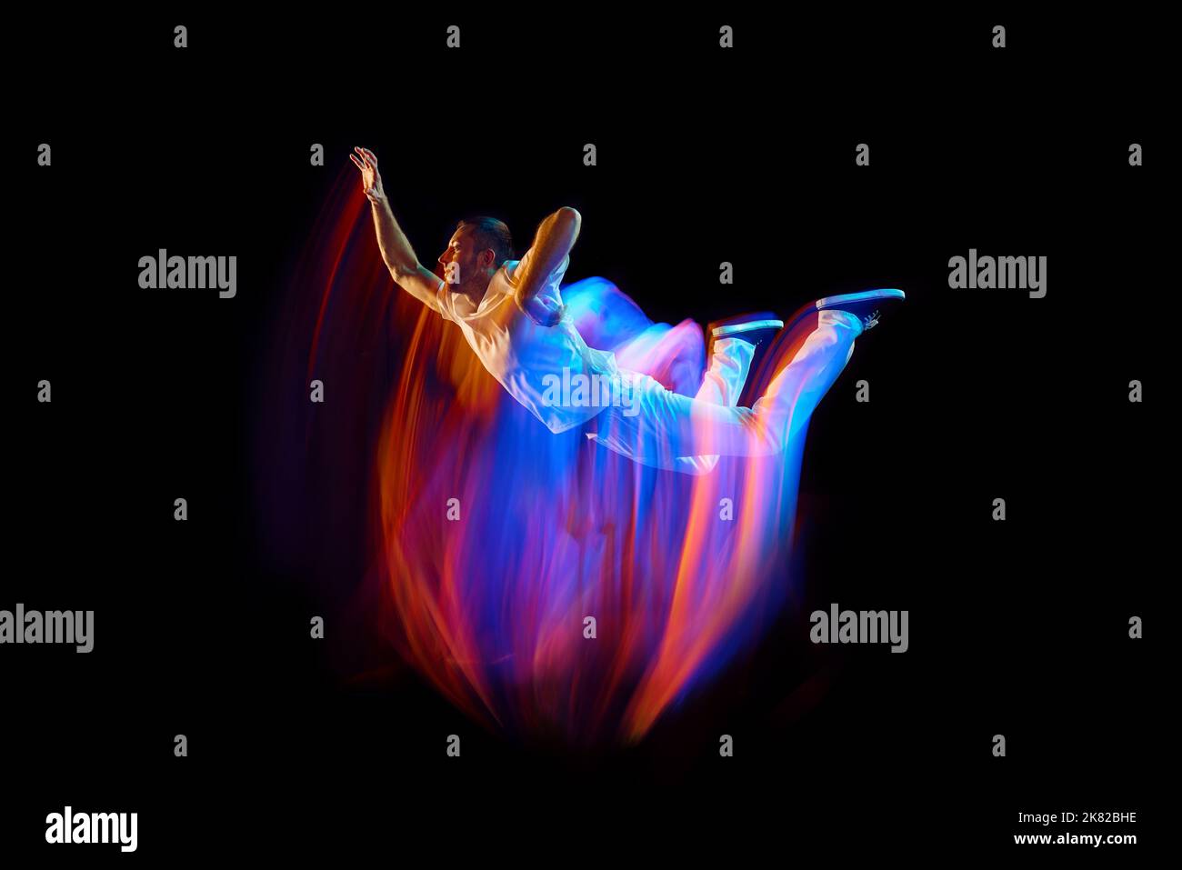 Levitation. One flying, jumping dancer or gymnast performing tricks in ...