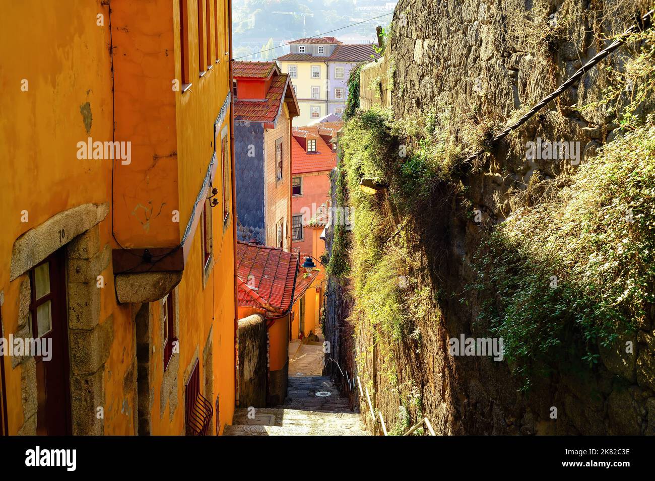 Oldtown narrow hill street, down stairs, traditional architecture ...