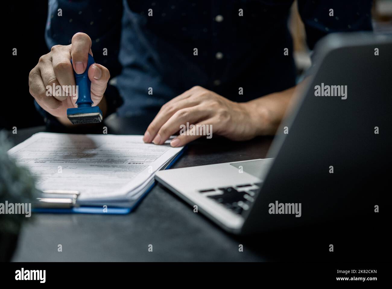 Man stamping approval of work finance banking or investment marketing ...