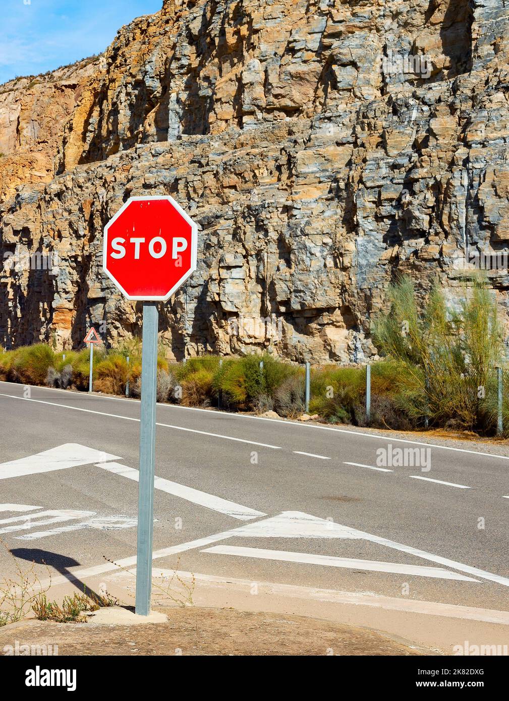 Stop sign on mountain road, sunshine landscape, Spain Stock Photo - Alamy