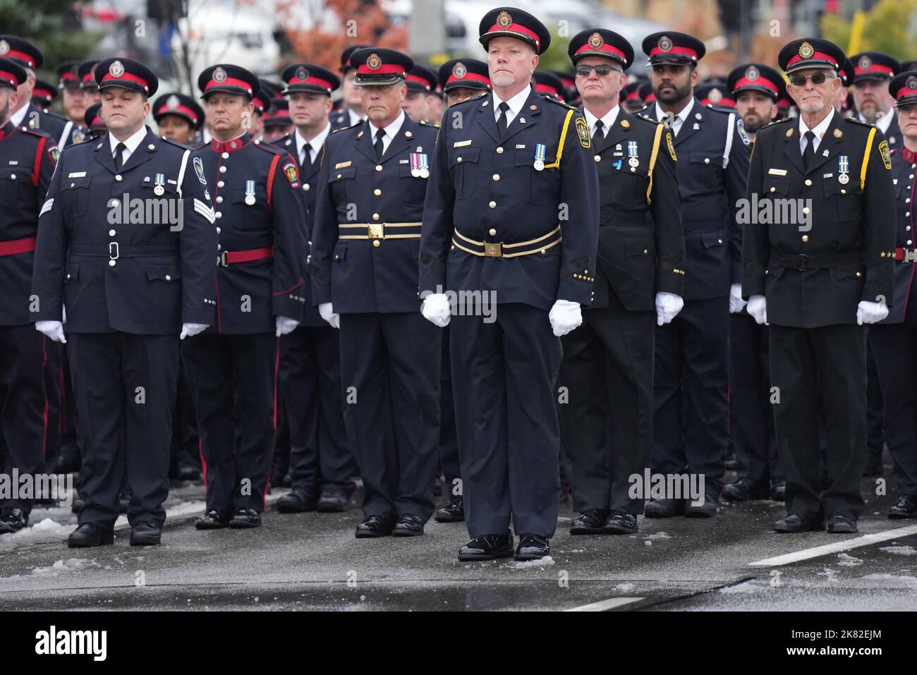 Police officers from different jurisdictions line up in a procession ...