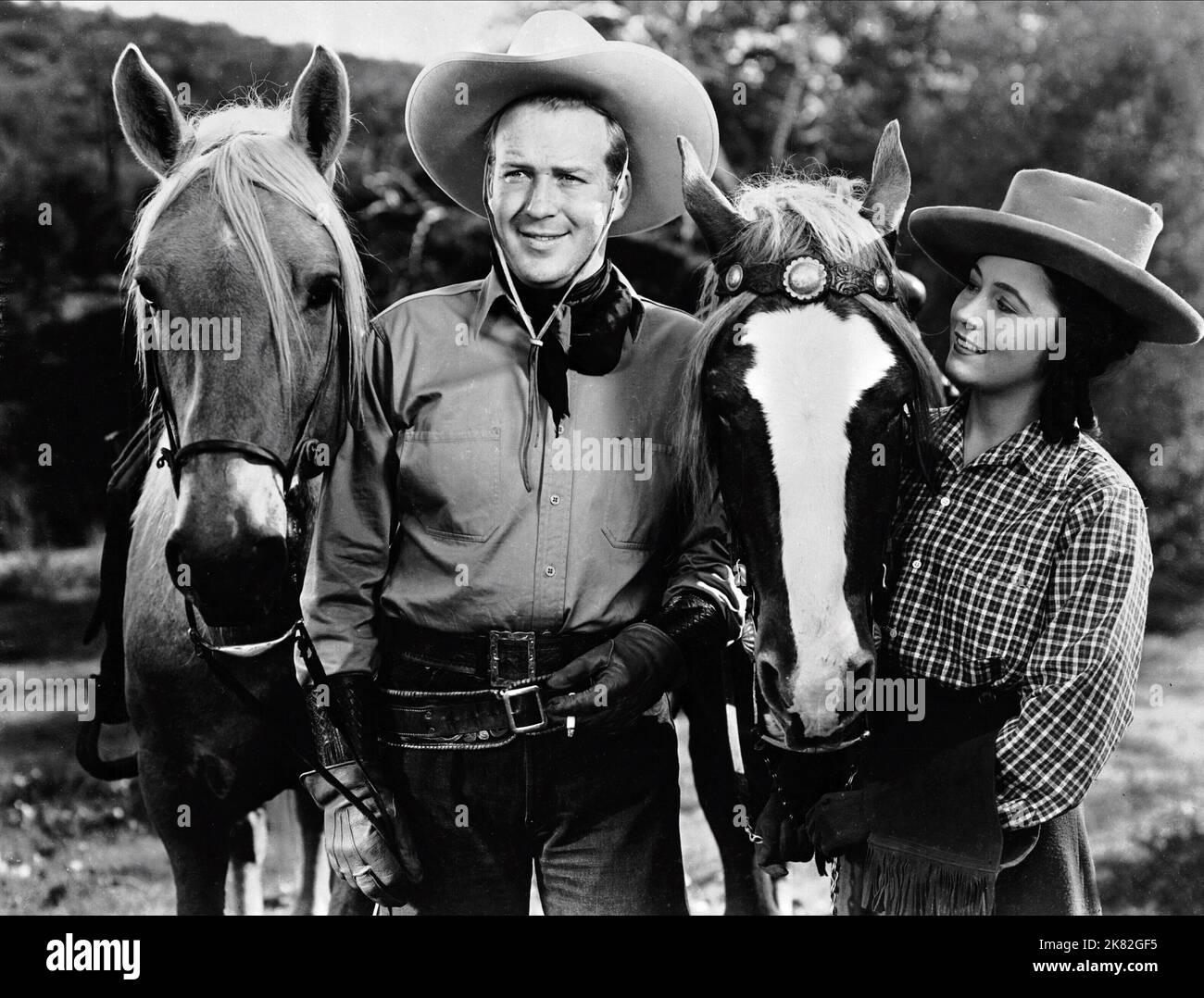 Dick Foran & Patricia Walthall Film: Empty Holsters (1937) Characters ...