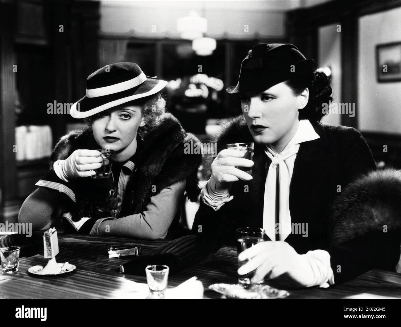 Bette Davis & Wini Shaw Film: Front Page Woman (1935) Characters: Ellen Garfield, Inez Cordoza ...