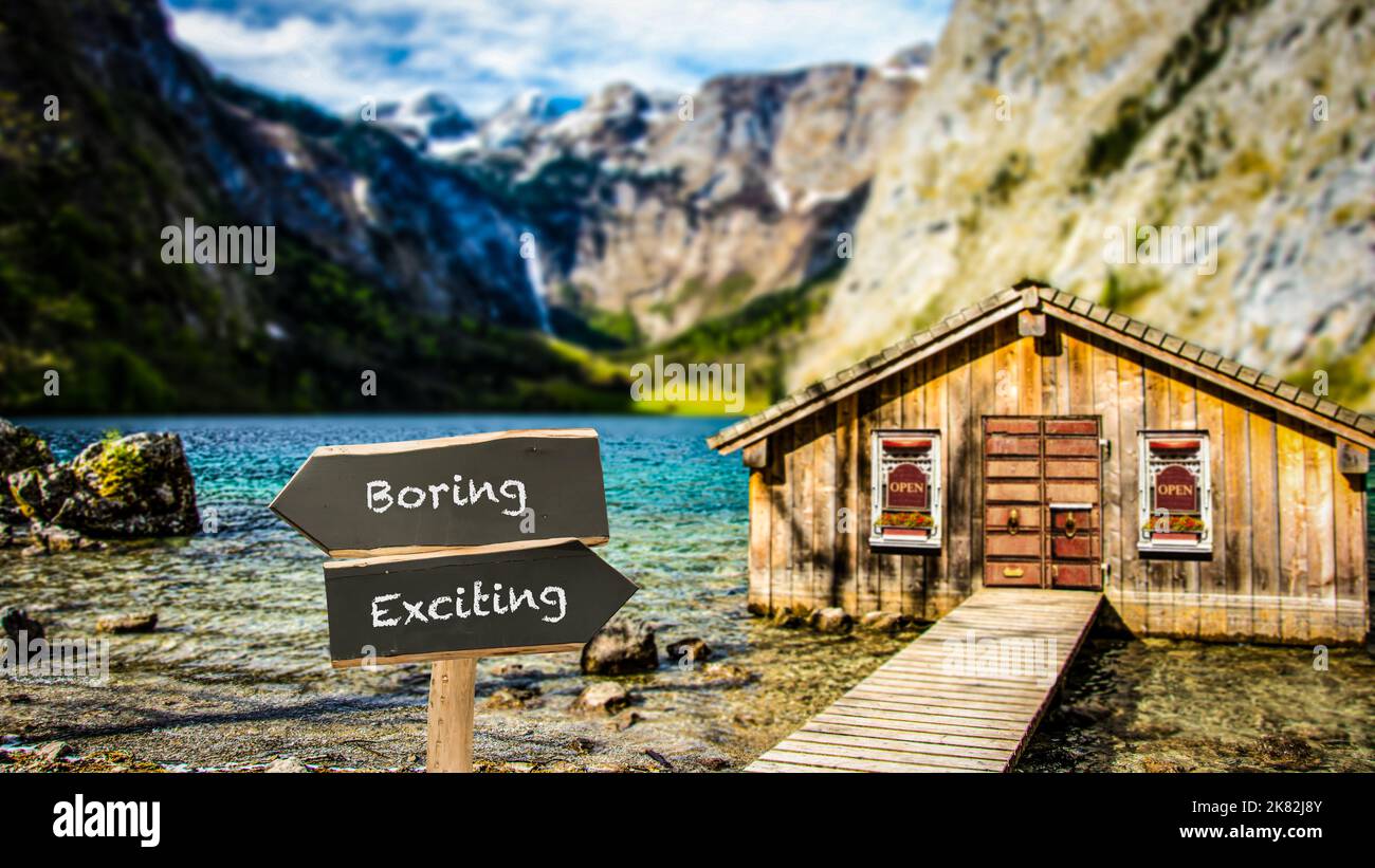 Street Sign the Direction Way to Exciting versus Boring Stock Photo - Alamy