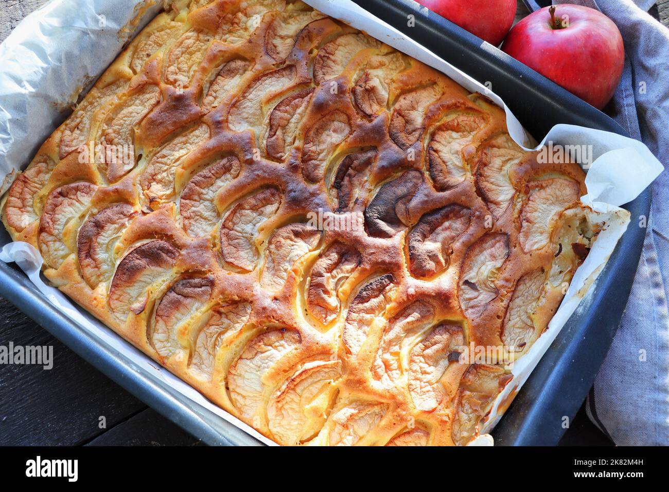 Clasic apple cake, selective focus. Homemade pie on rustic wooden ...
