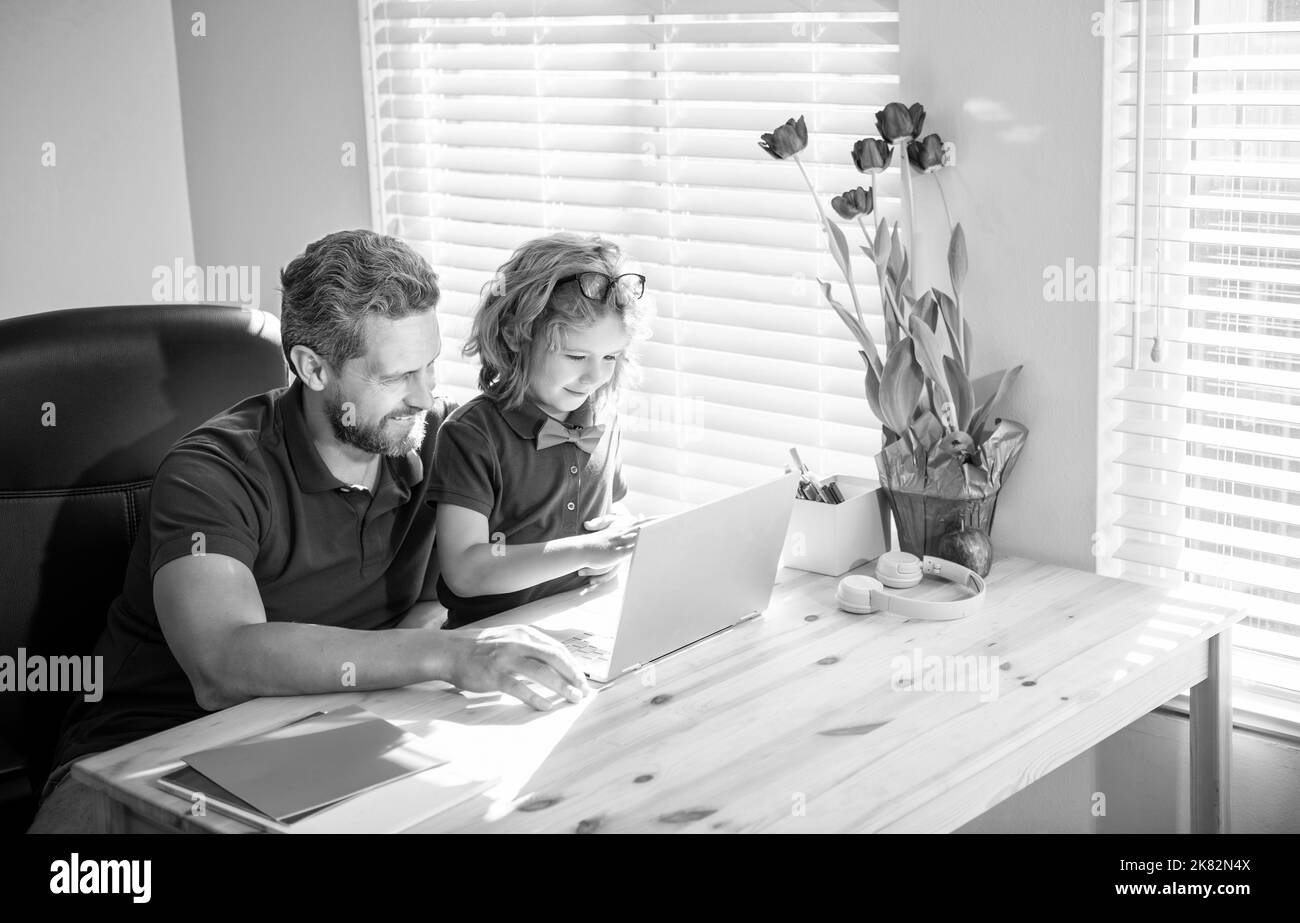 homeschooling and elearning. back to school. happy dad and son in ...