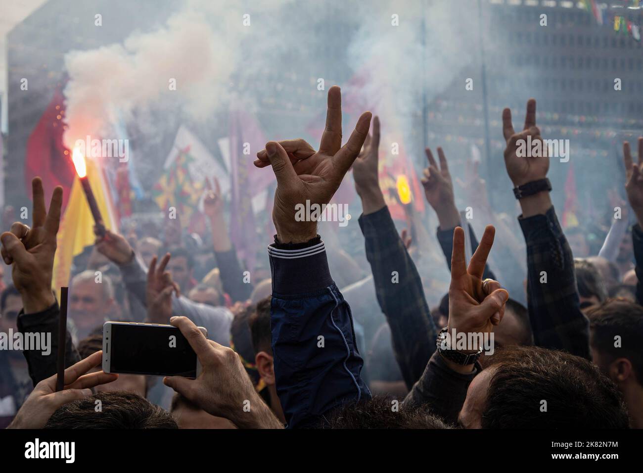 People make victory gestures during the celebration of the beginning of ...