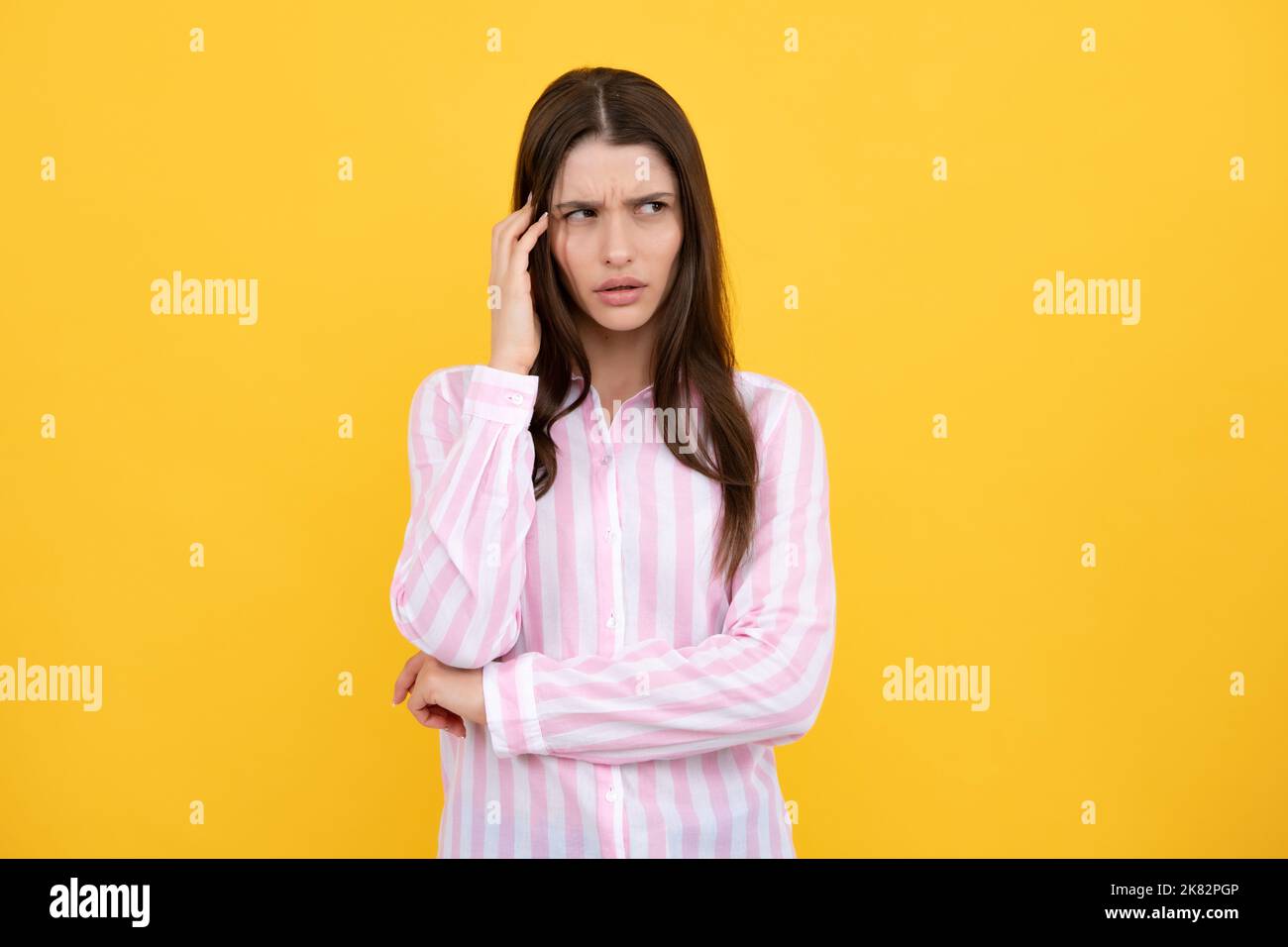 Portrait of young woman feeling stress or strain headache. Exhausted ...