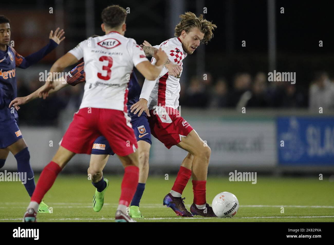 Werkendam - (lr) Bartosz Bialek of Vitesse, Lowie van Zundert or Kozak ...
