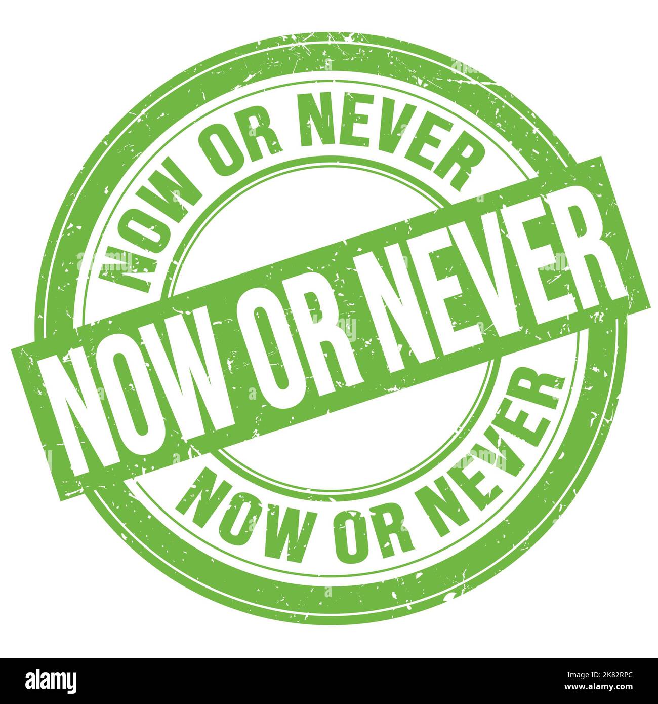 NOW OR NEVER text written on green round grungy stamp sign Stock Photo ...