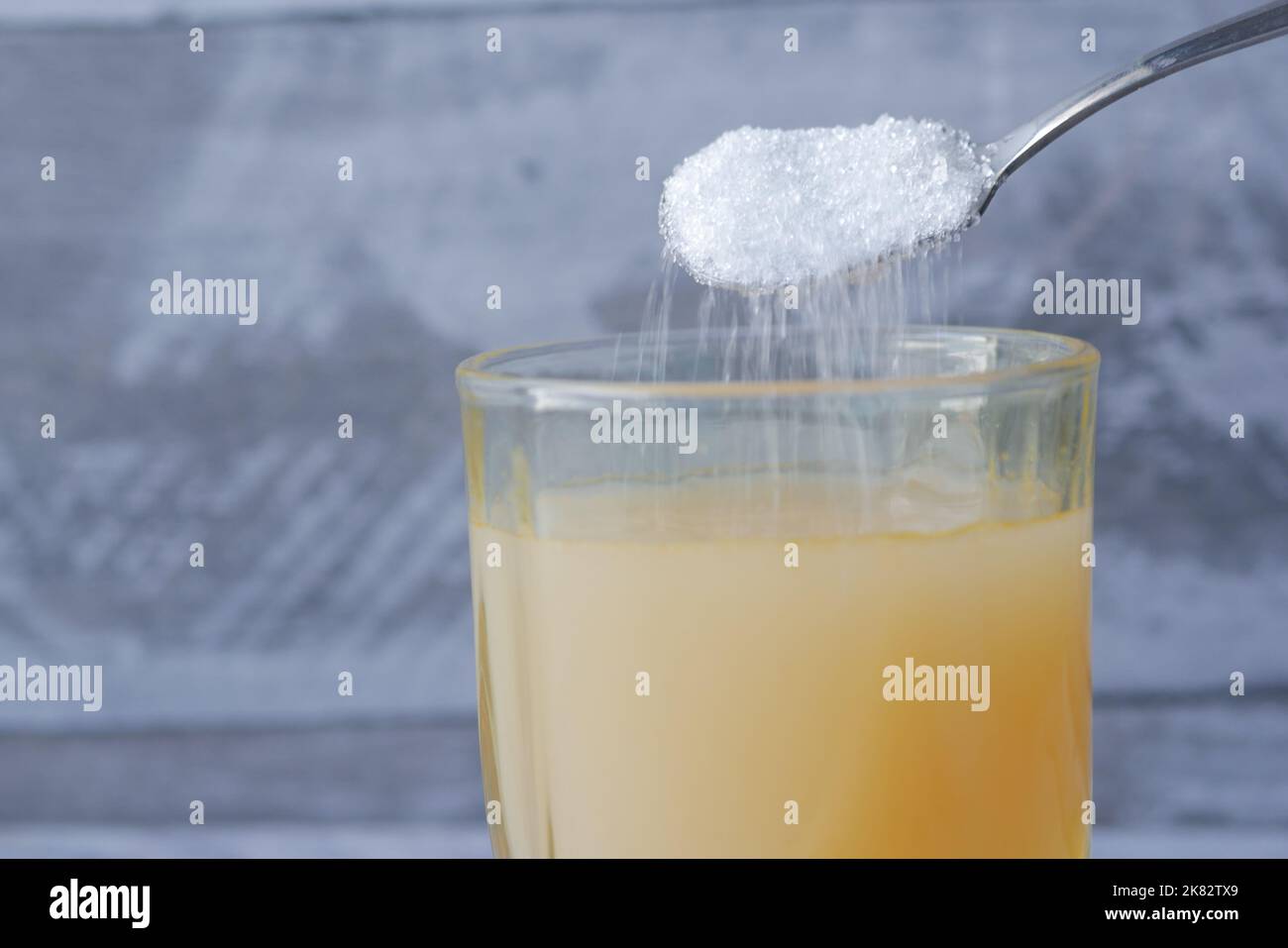 Sugar pouring in water hi-res stock photography and images - Alamy