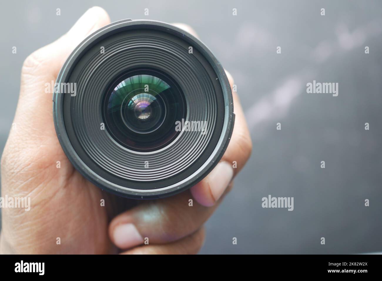Top view holding camera lenses hi-res stock photography and images - Alamy