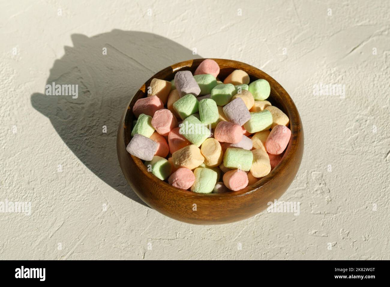Multicolor marshmallow on lights white background. Top view. Solar ...