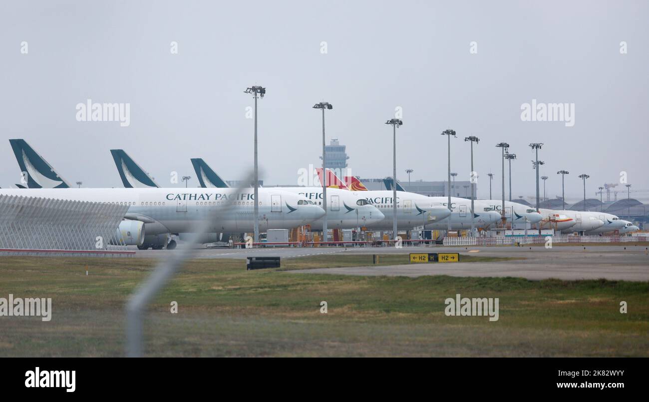 Cathay Pacific passenger airplanes are parked at the runway at the Hong ...