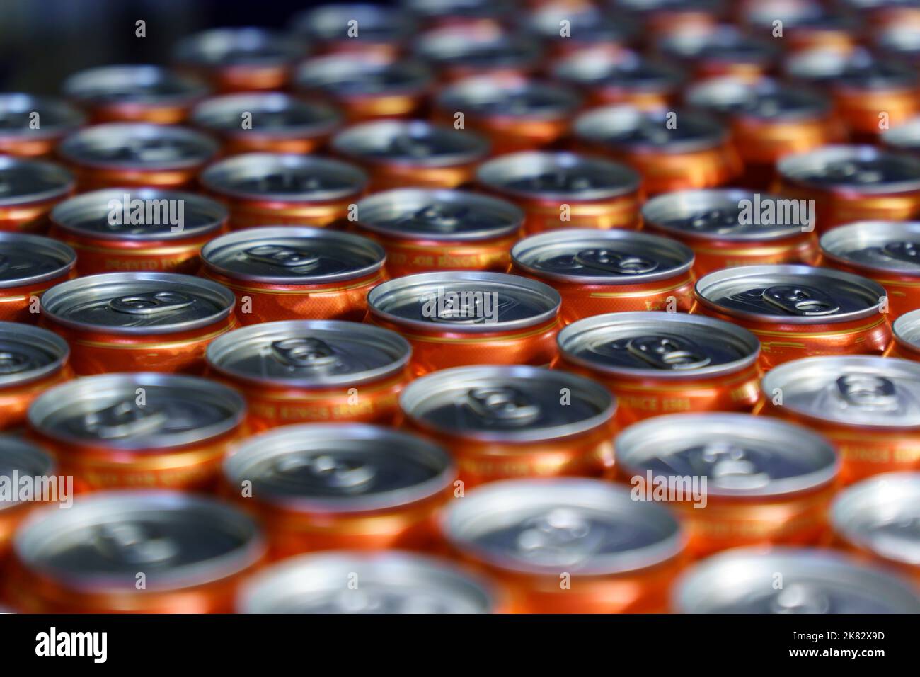 A lot of beer aluminum cans background texture. Sale of alcohol in a ...