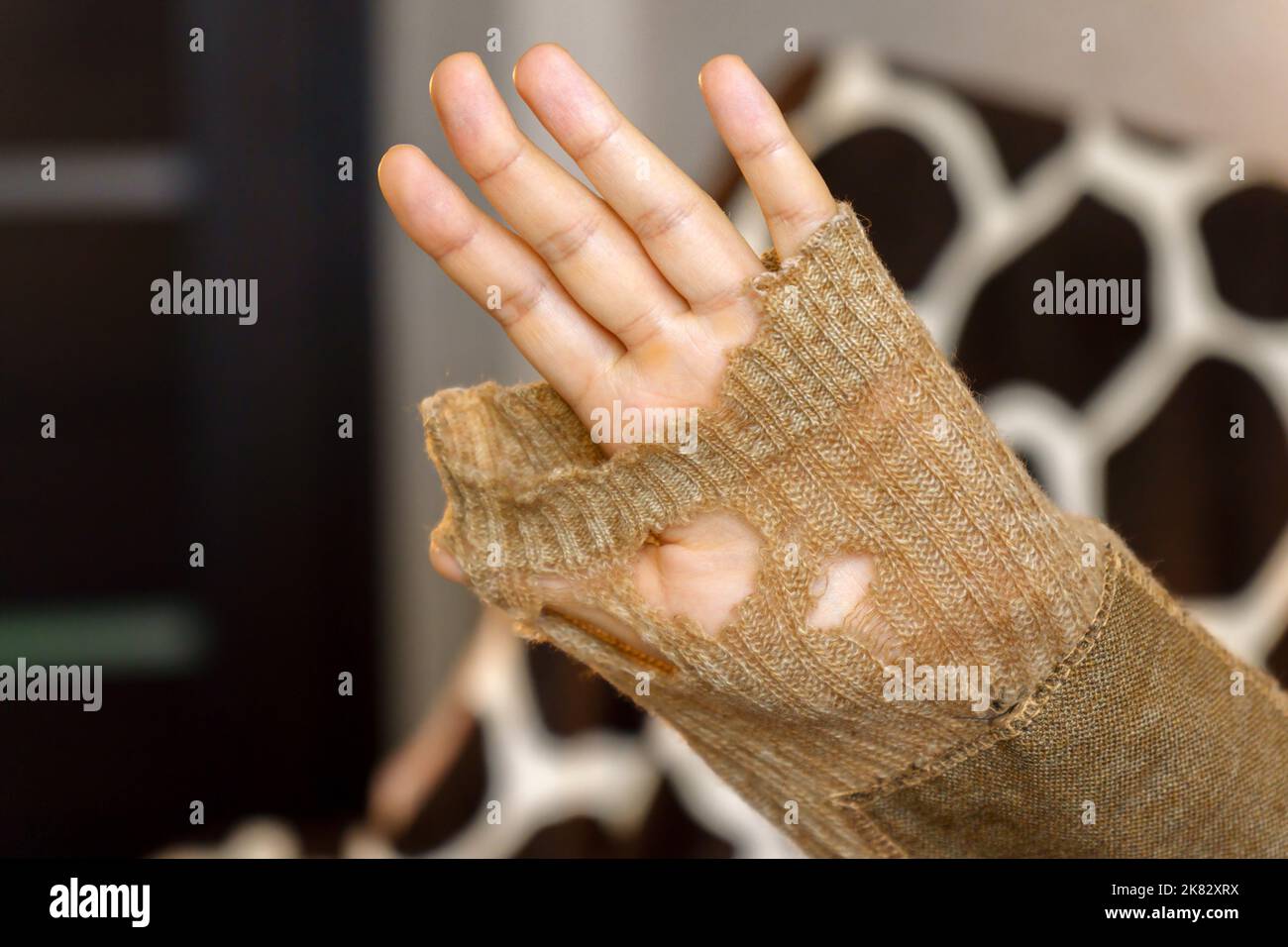 Mending clothes. Concept of mending and repairing clothes. Creative ...