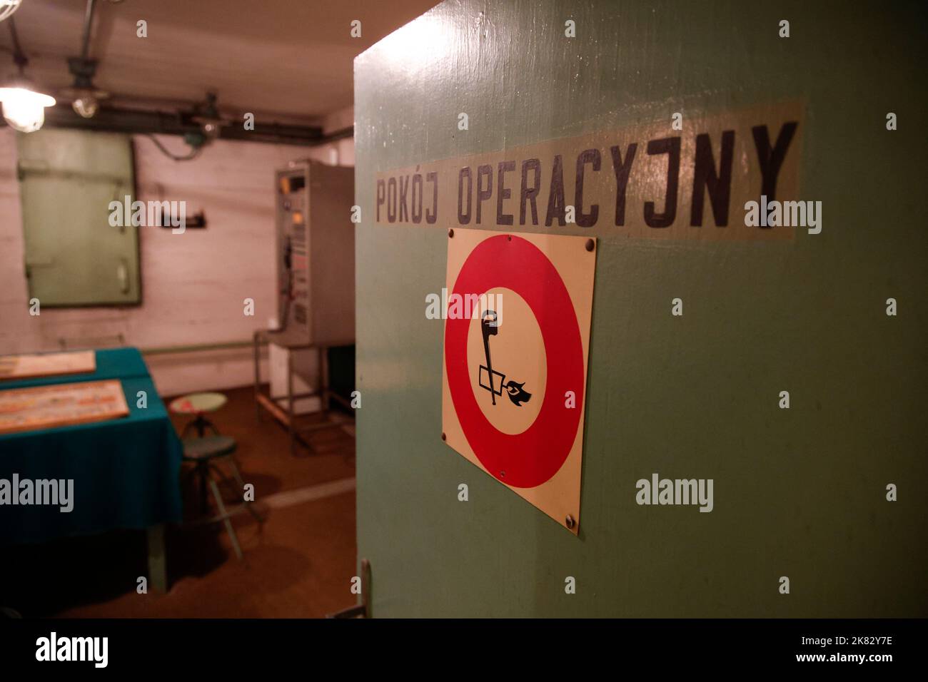 A sign is seen on a door of a command room in a disused bomb shelter in ...