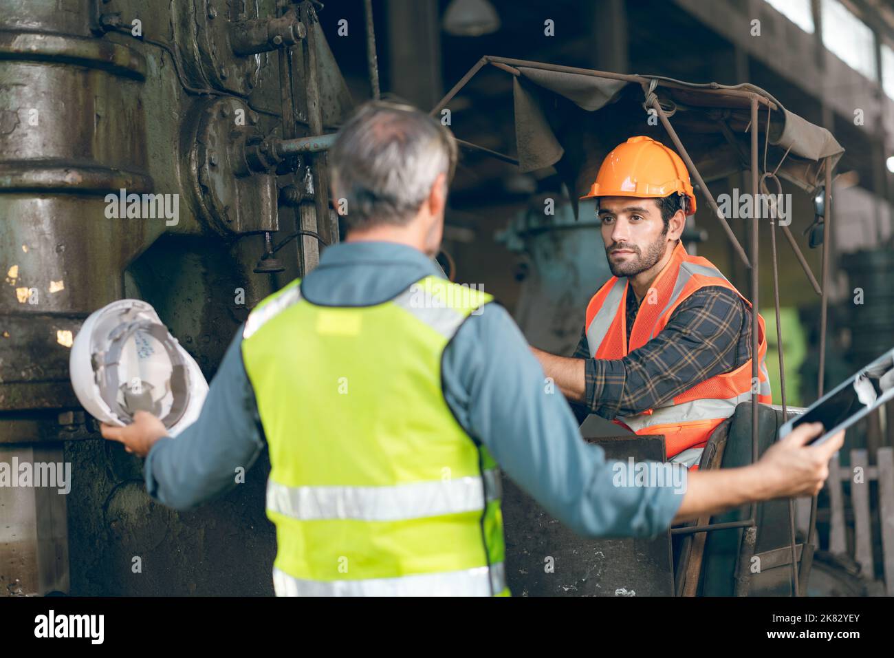industrial factory with men at work concept, professional engineer ...