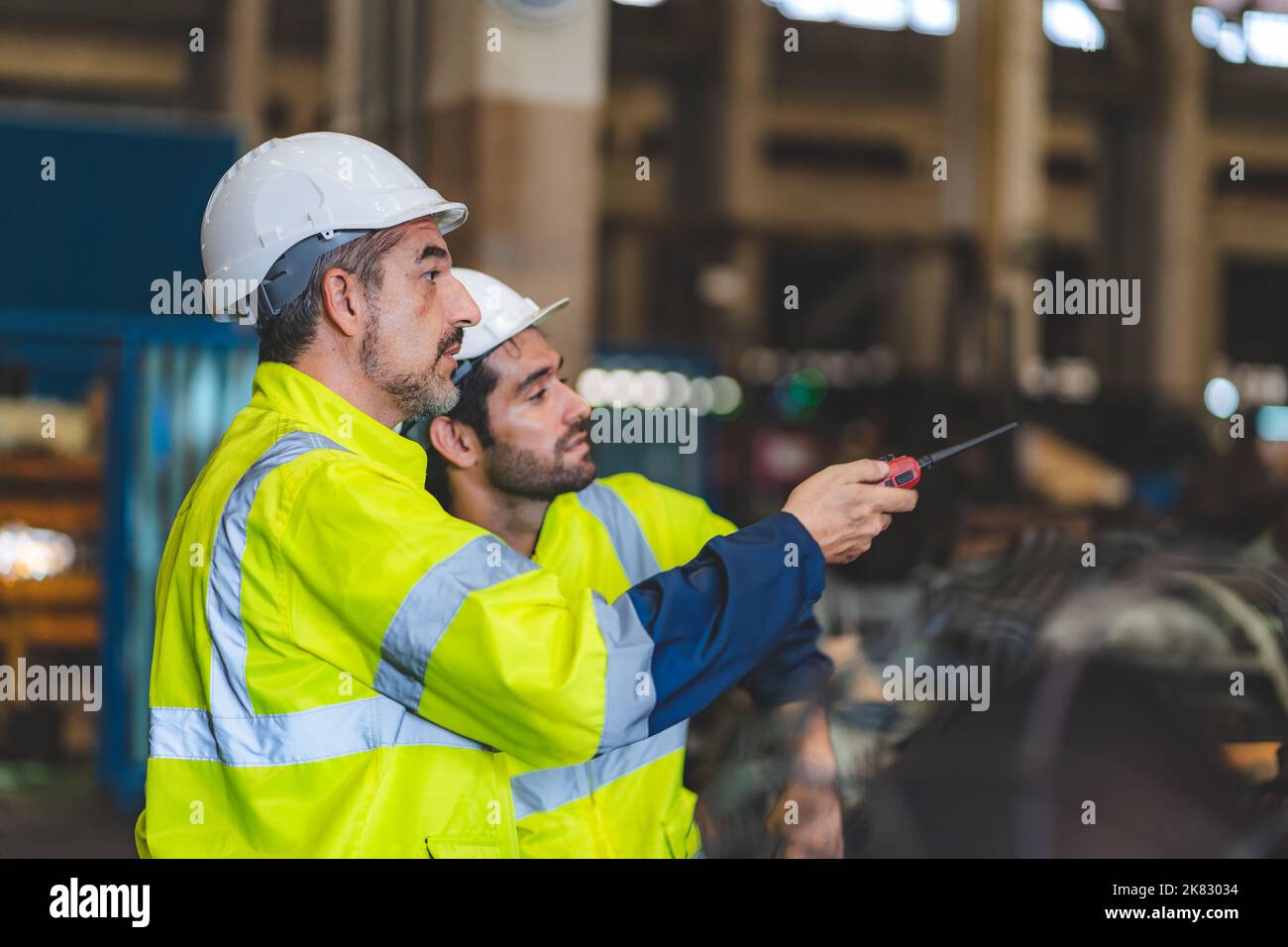 industrial factory with men at work concept, professional engineer ...