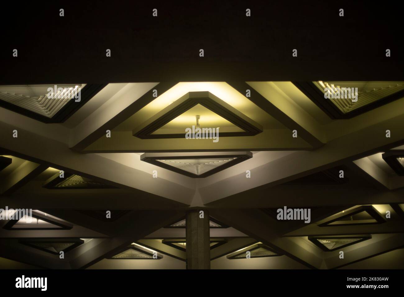 Light triangle. Lamp on ceiling. Light design. Architecture of 20th ...