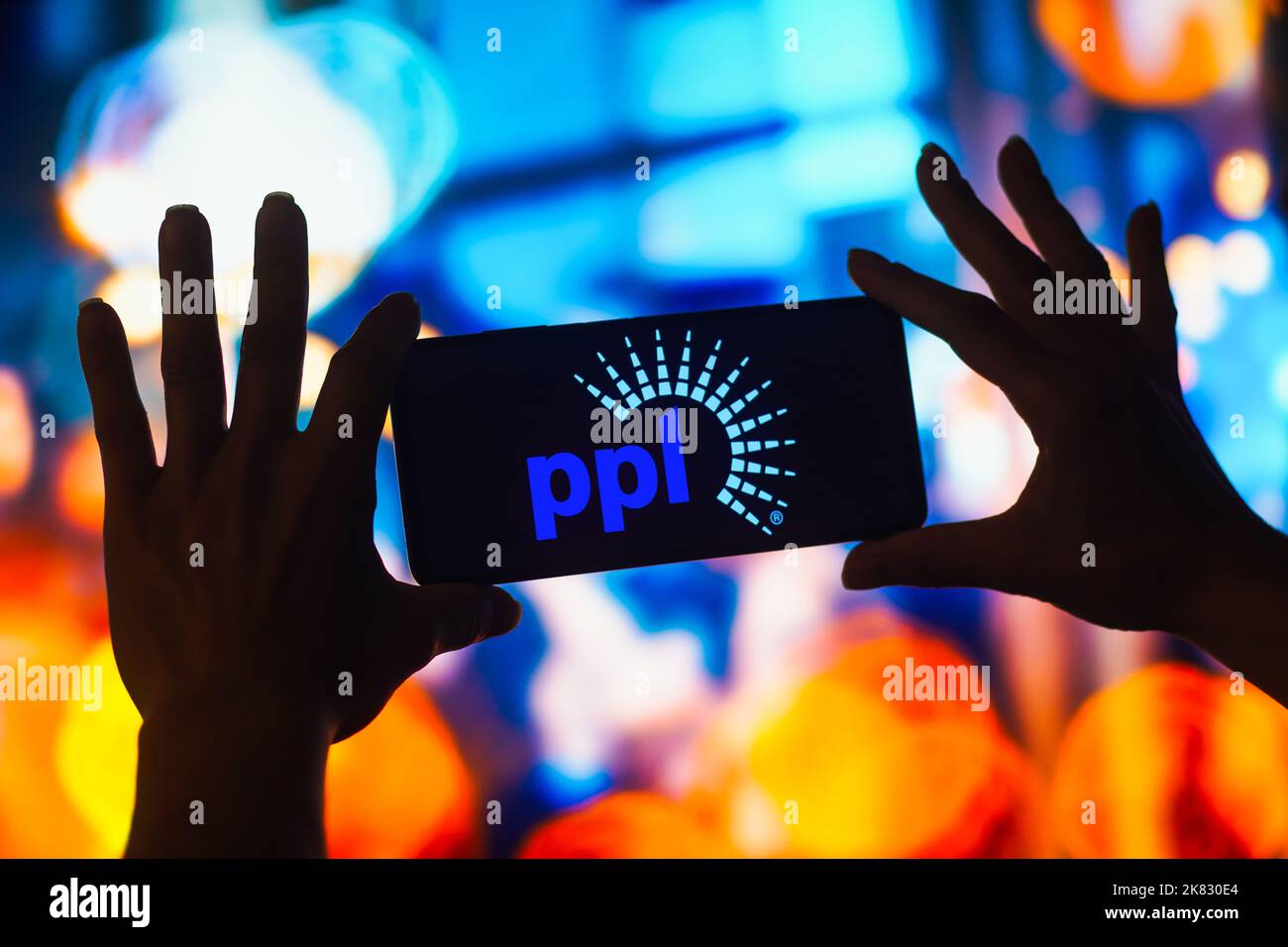 In this photo illustration, the PPL Corporation logo is displayed on a ...