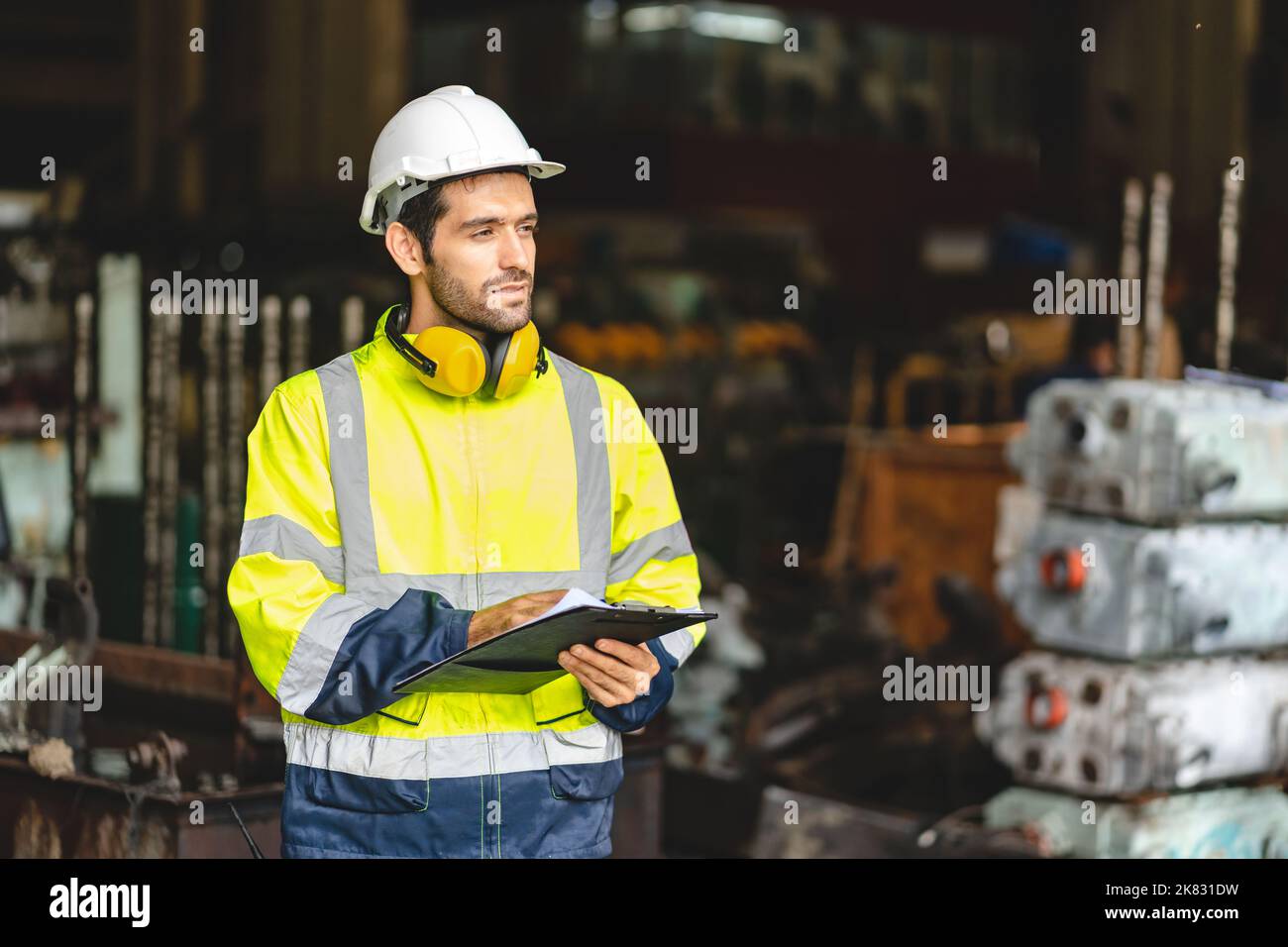professional technician engineer with safety hard hat working to ...