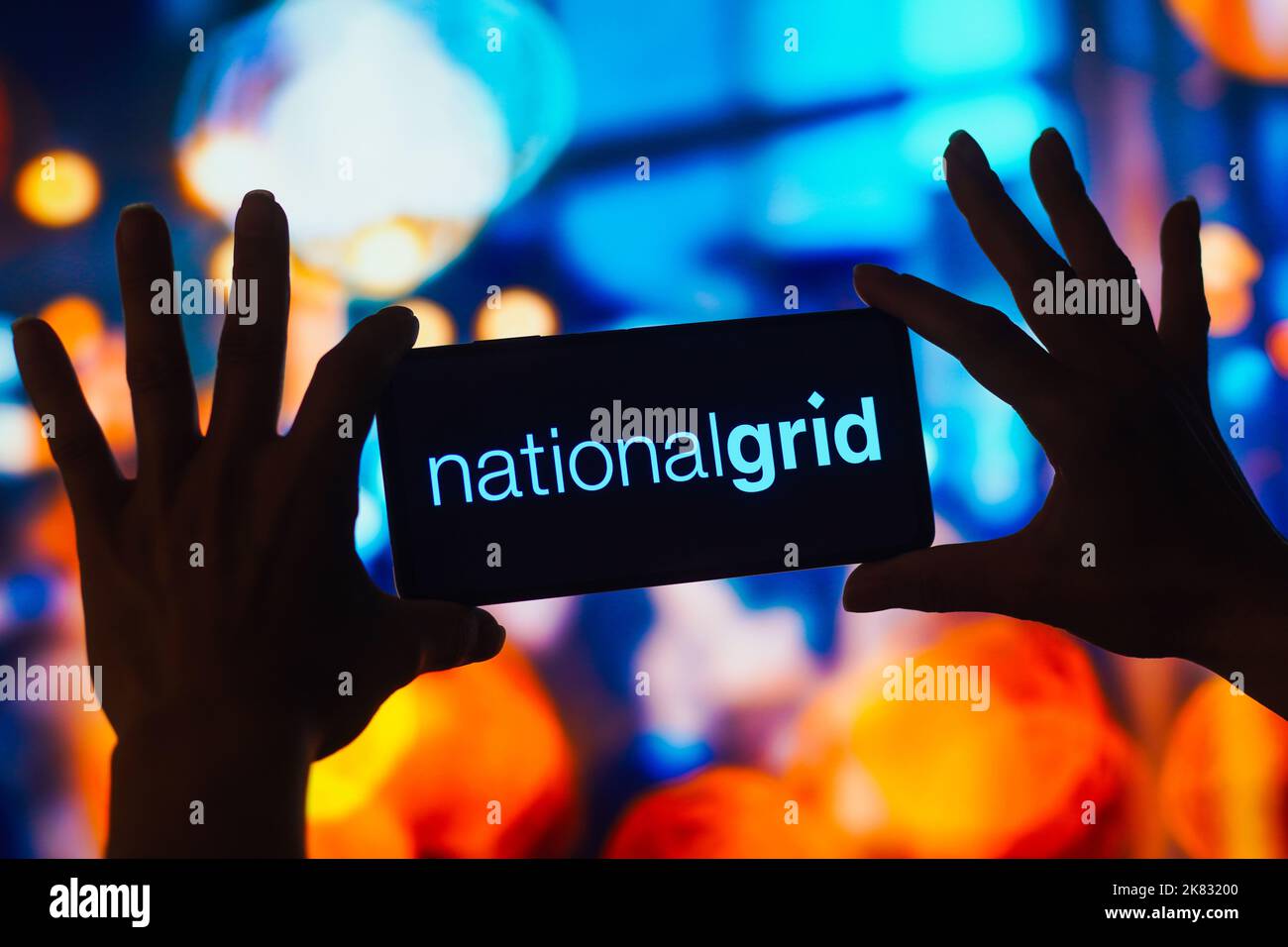 In this photo illustration, the National Grid plc logo is displayed on ...