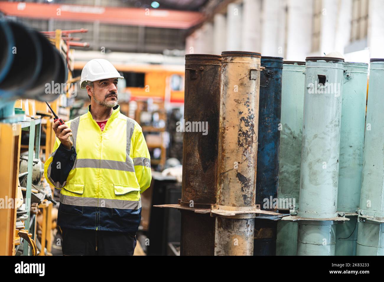 professional technician engineer with safety hard hat working to ...
