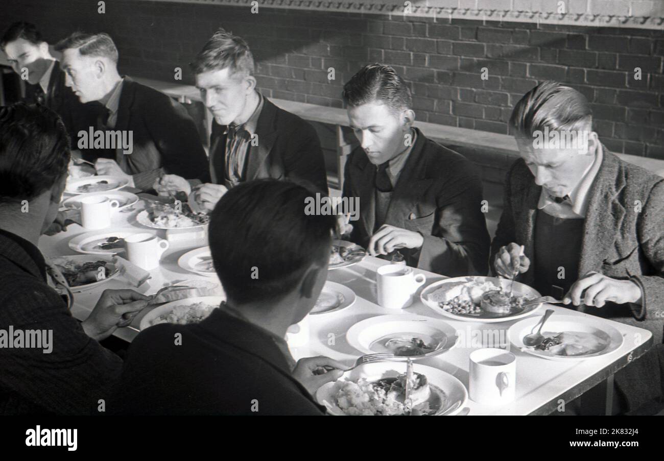 1930s, historical, unemployed mine and steel workers sitting together ...