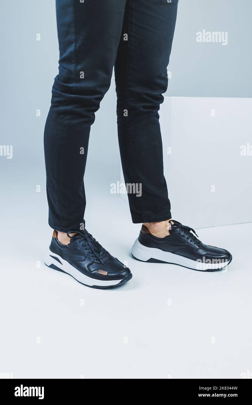 Men's legs in casual shoes of black color made of genuine leather, men ...
