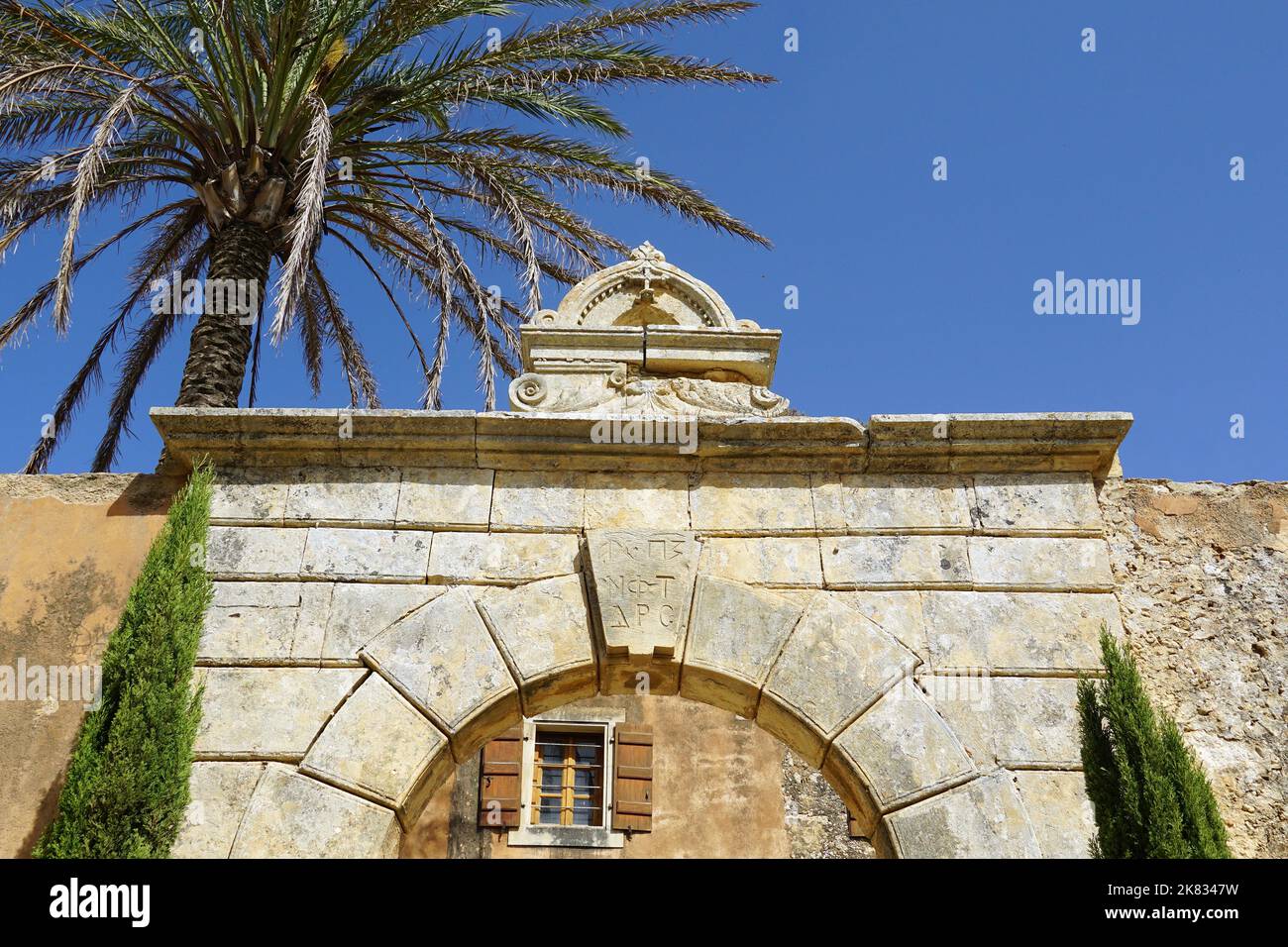 The entrance to the courtyard of the refectory, Arkadi Monastery, Crete ...