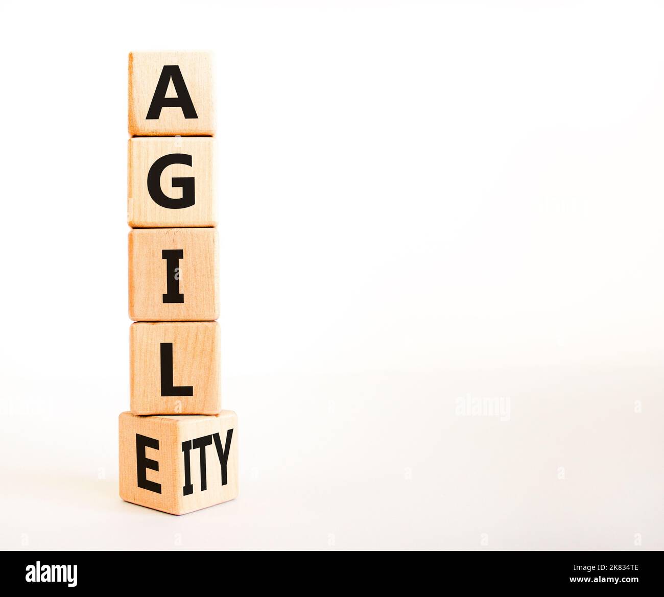 Agile and agility symbol. Concept words Agile and Agility on wooden ...