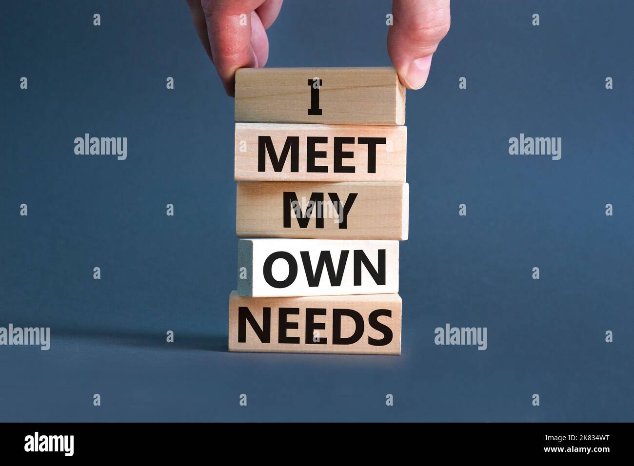 I meet my own needs symbol. Concept words I meet my own needs on wooden ...