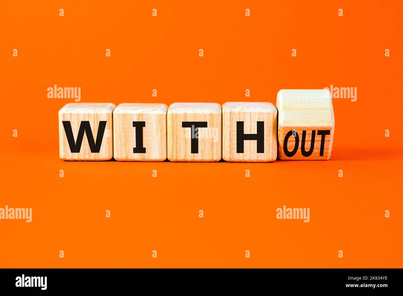 Without or with symbol. Concept words Without and With on wooden cubes ...