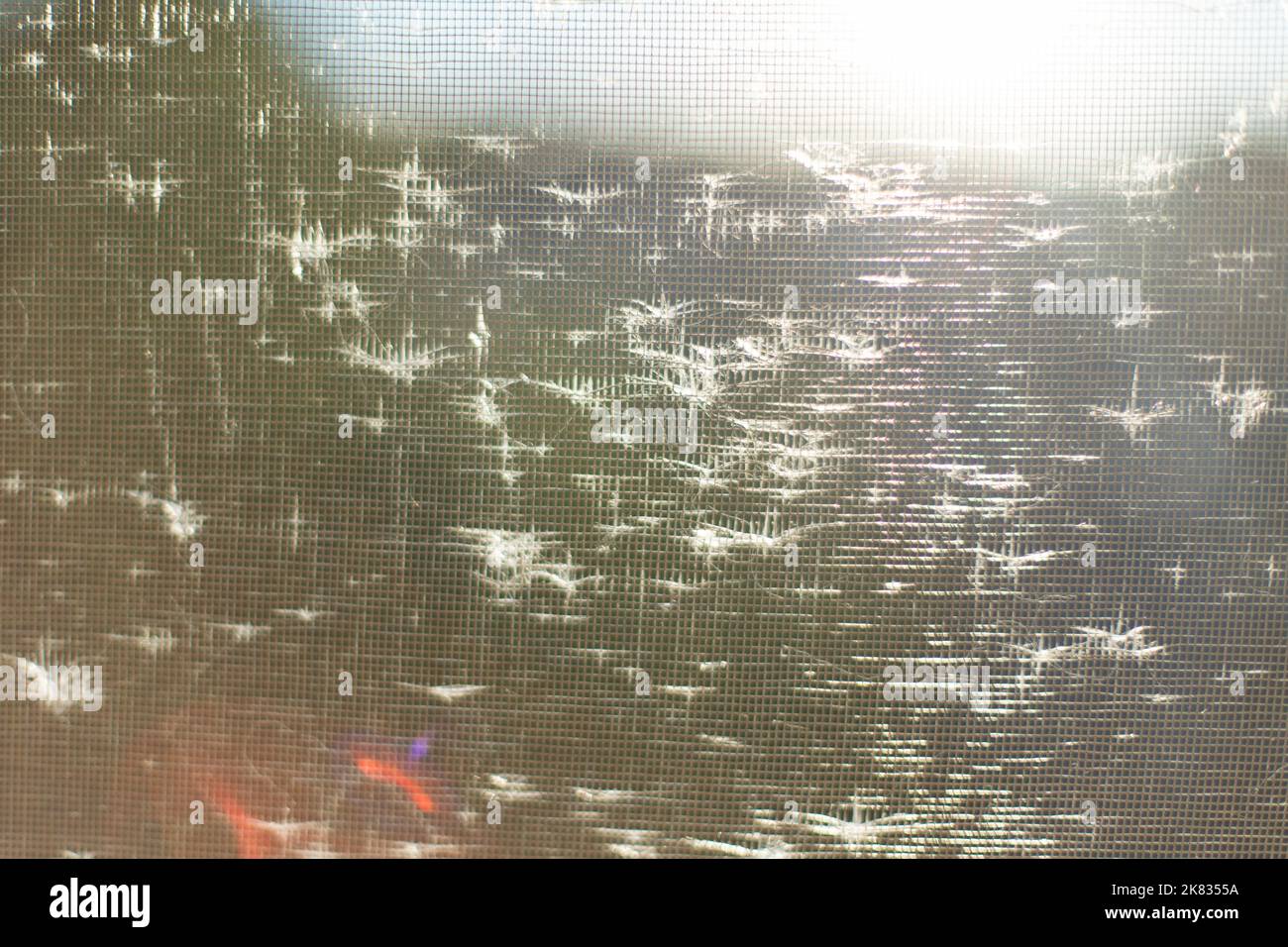 Grid in sun. Grid on window. Window details. Background of rays of ...