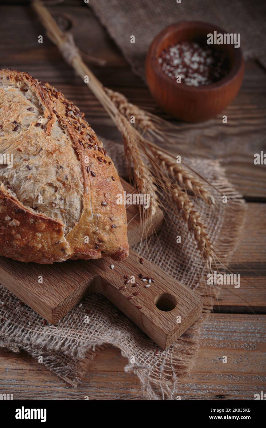 Fresh baked whole grain bread with flax seeds Stock Photo - Alamy
