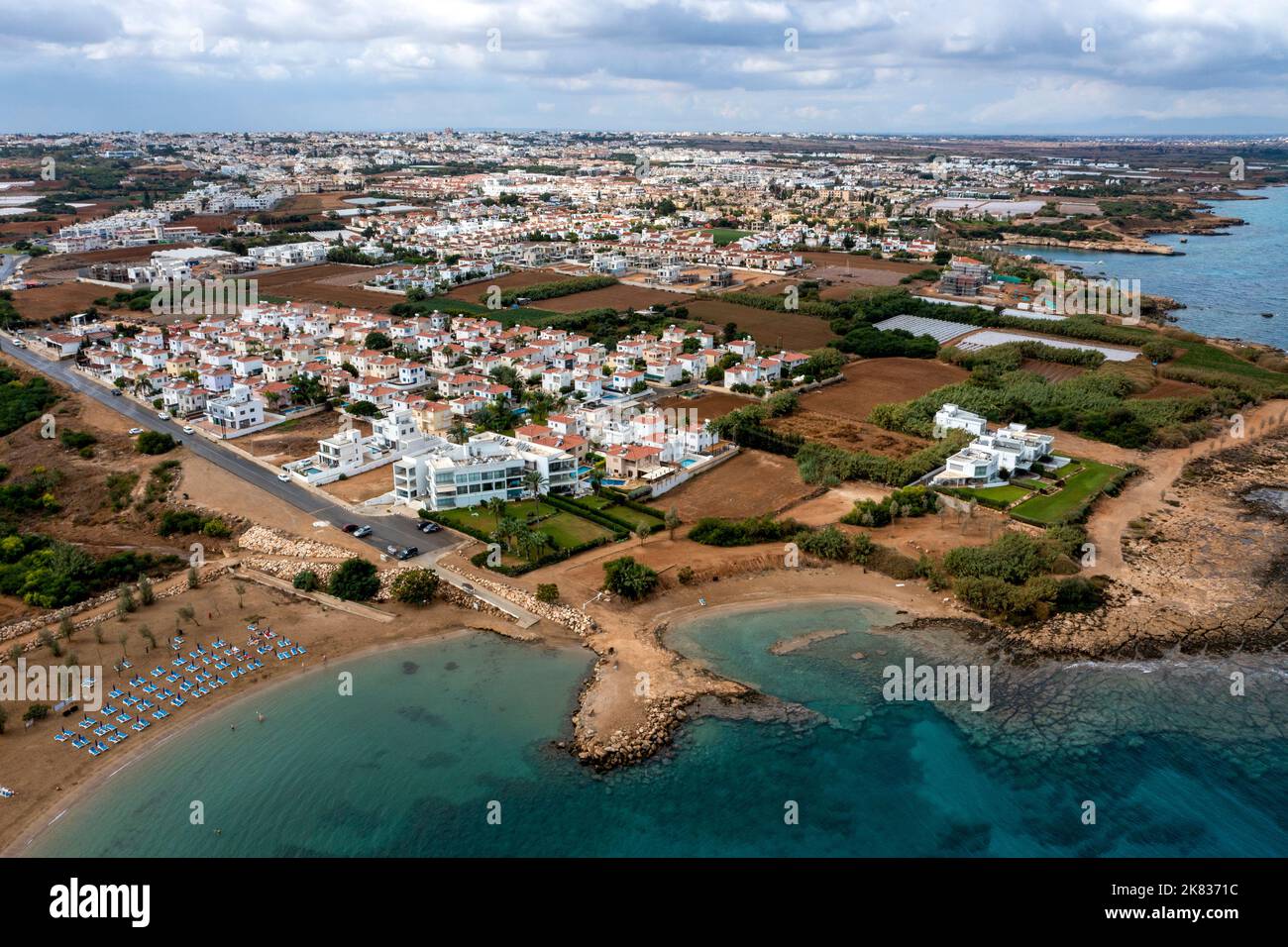 Aerial view of Agia Triada beach the coastline looking north from ...
