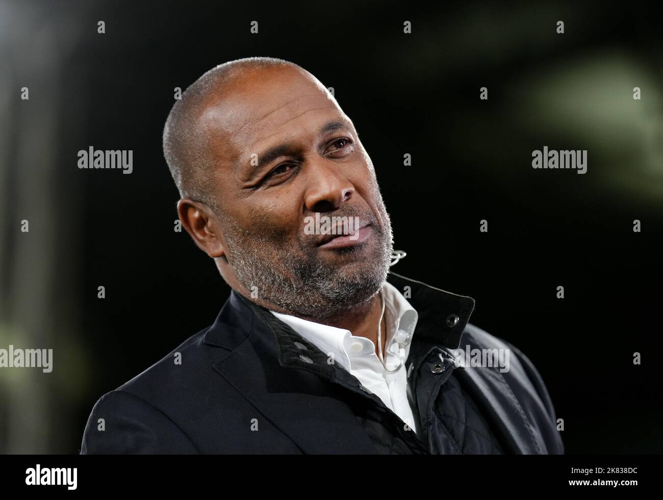 Former footballer Les Ferdinand prior to the Premier League match at ...