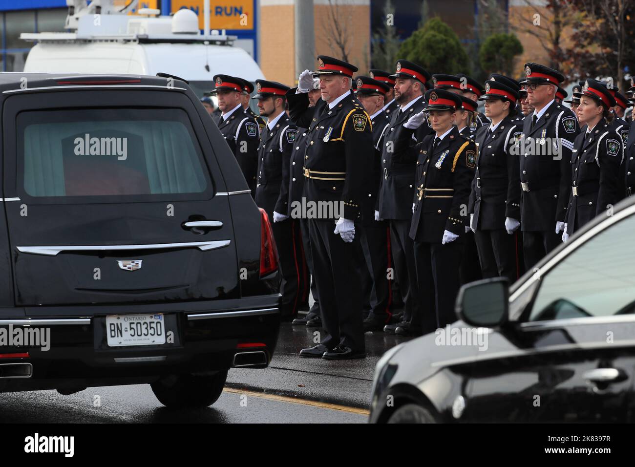 South Simcoe Police Acting Chief John Van Dyke salutes the arriving ...