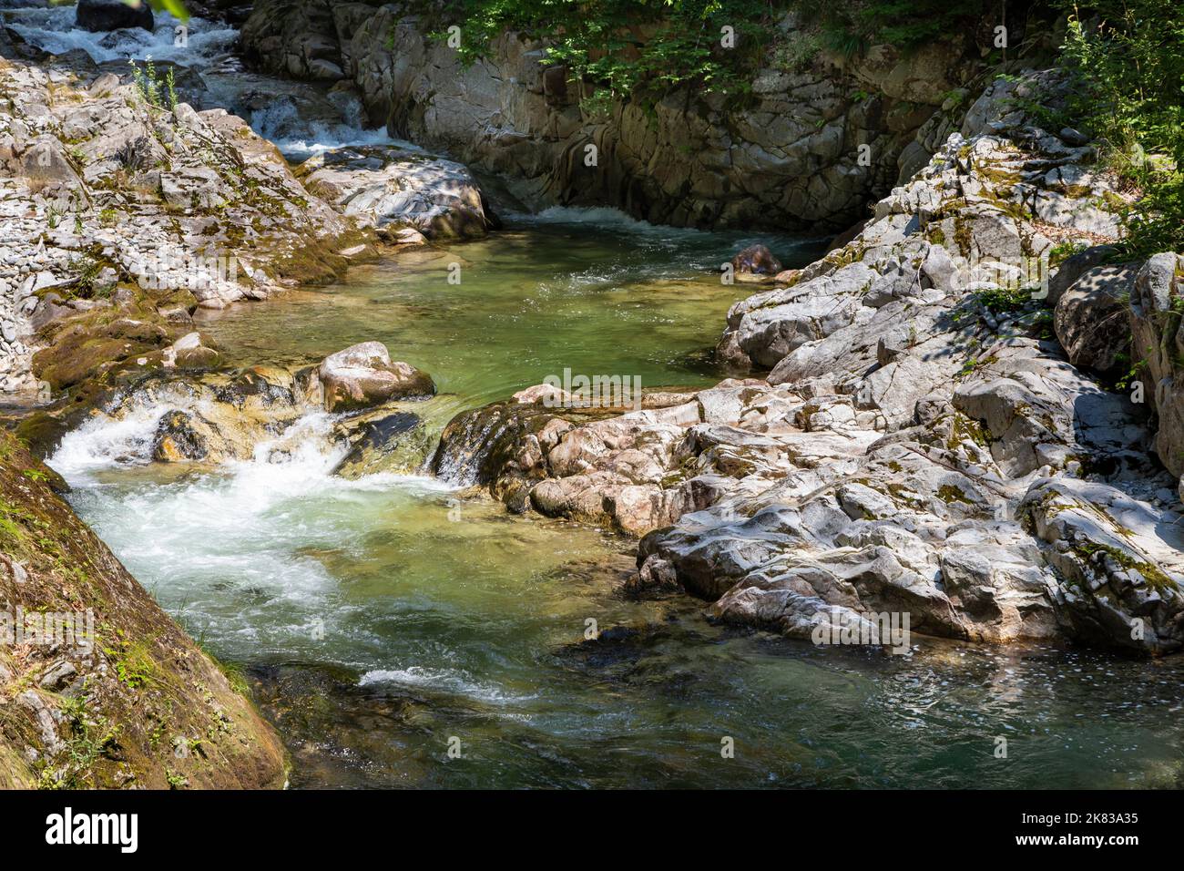 Landscape on the upper course of the river Gilort, Gorj, Romania ...