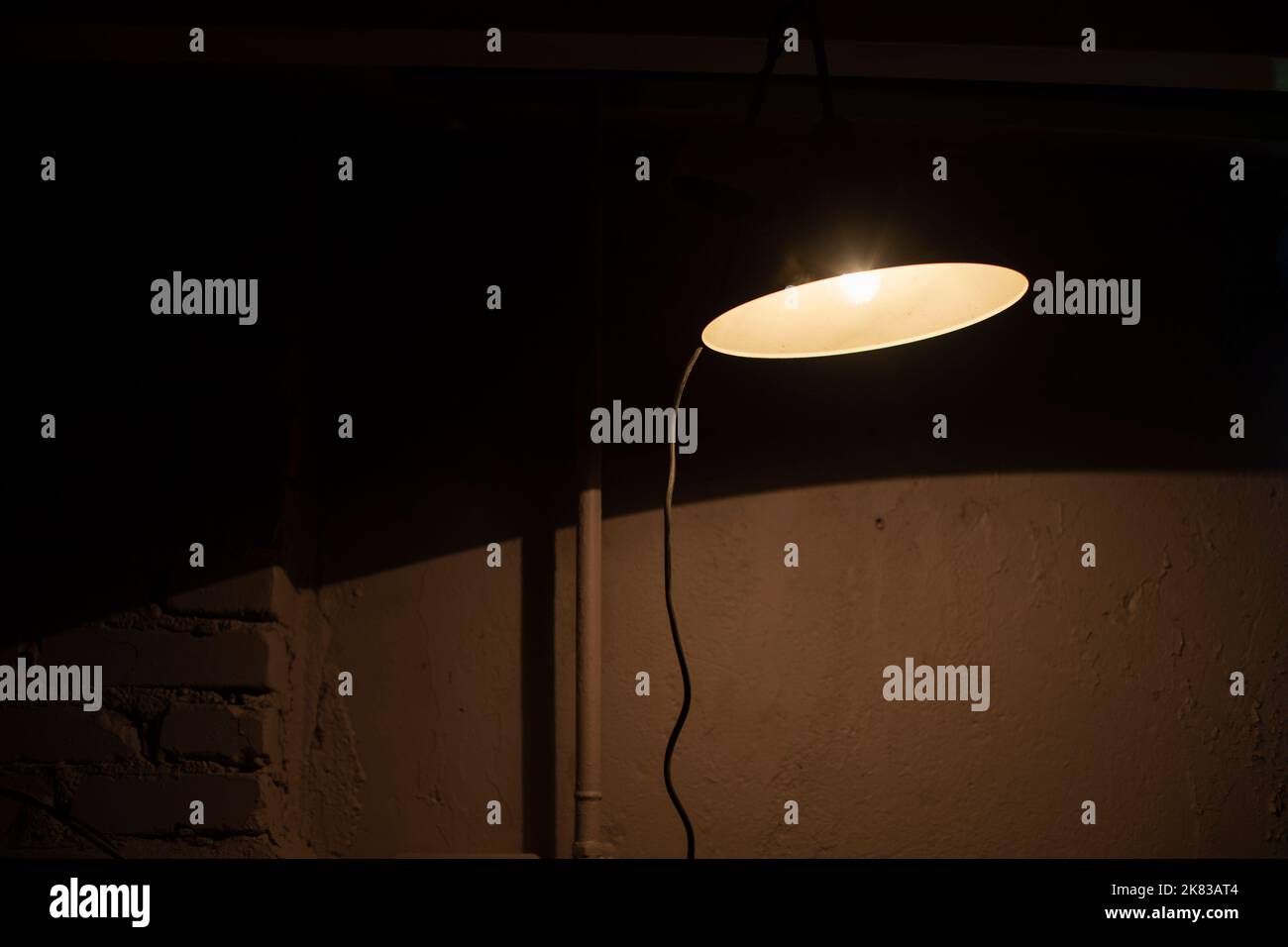 Lamp in room. Dim light indoors. Utility room. One lamp Stock Photo - Alamy
